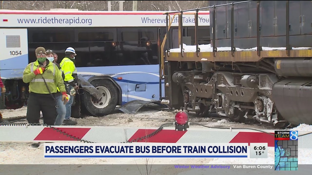 No injuries when train hits Rapid bus - YouTube