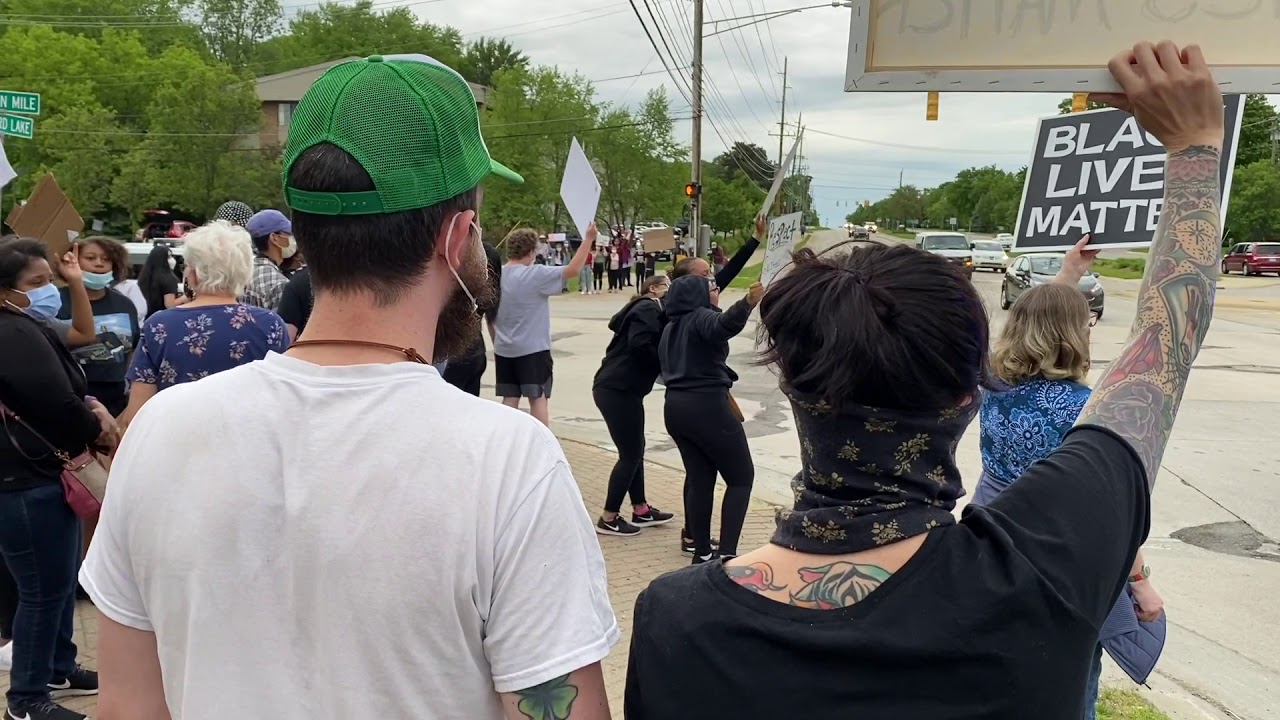 Scores protest peacefully in Farmington Hills - YouTube