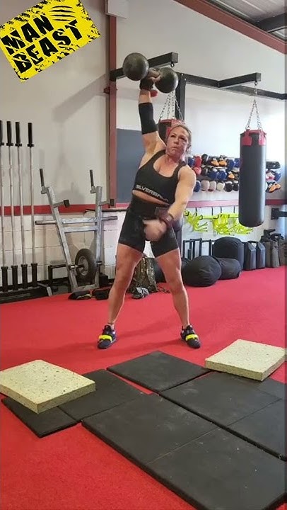 Shredded world's strongest woman Donna Moore 53kg dumbell , down to 82kg bodyweight - YouTube