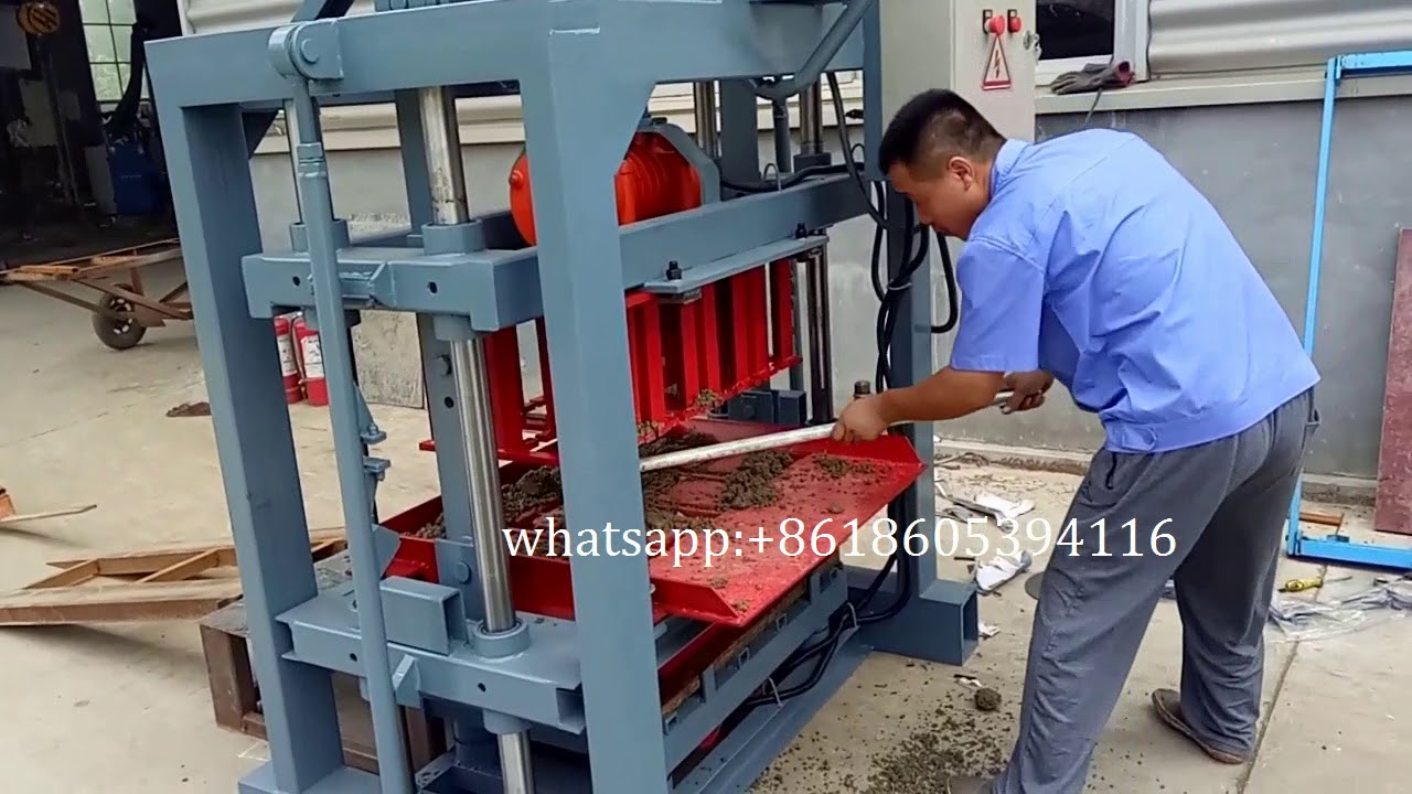 qt4-40 (qt40-2) small manual concrete hollow block making machine - YouTube