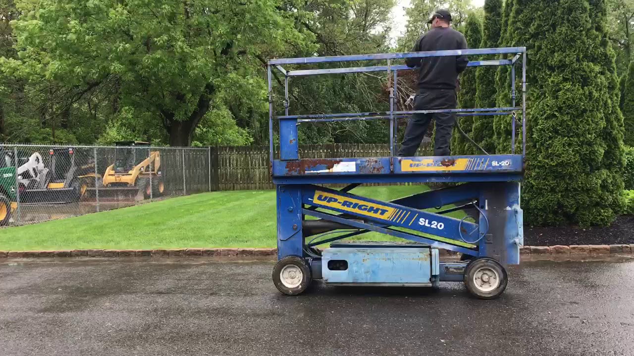 upright scissor lift - YouTube