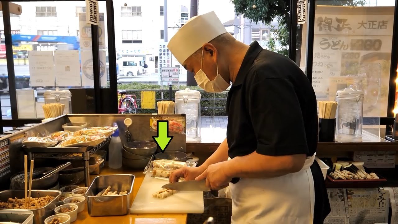 A stand-up udon chef serving orders like dancing Japanese delicacies ...