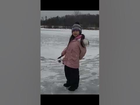 Girl ice fishing - YouTube