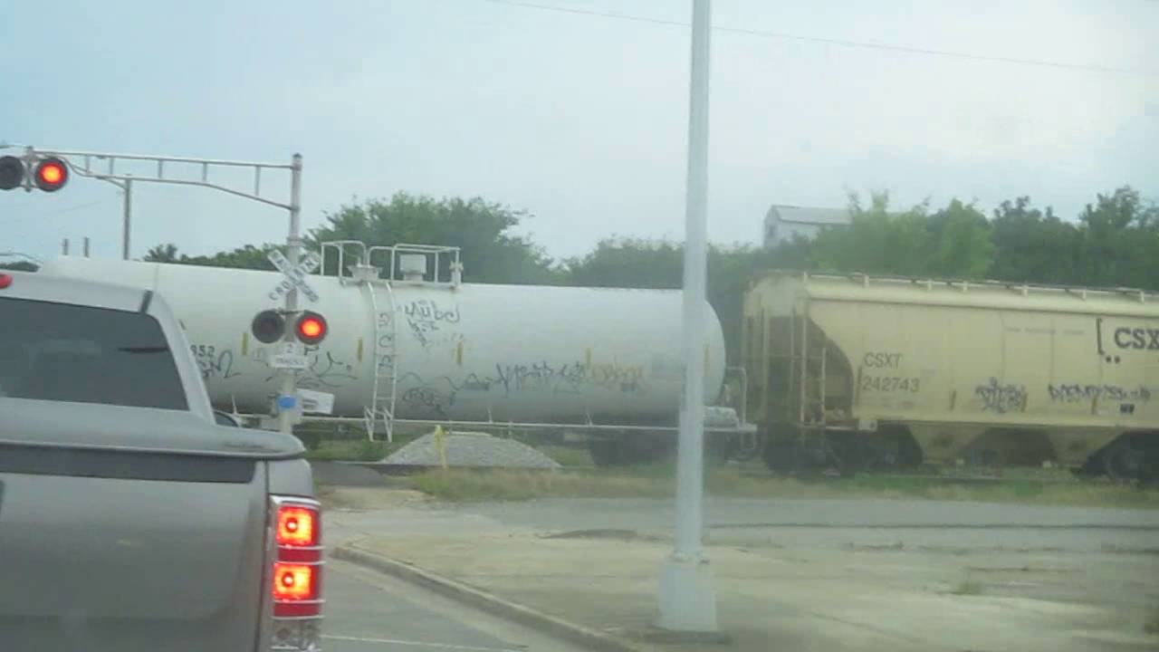 CSX 3204 and CSX 3052 pull a CSX mixed freight south through Decatur ...