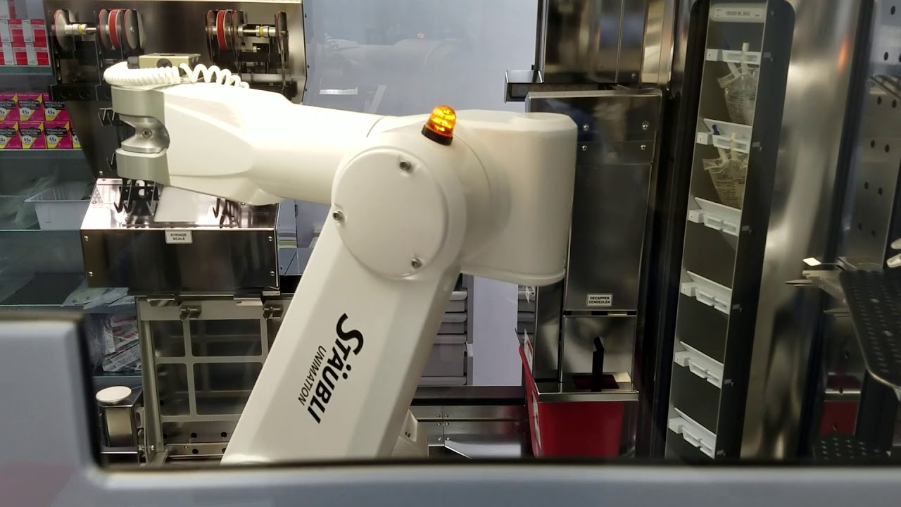 RIVA Compounding Robot in Action (making syringes) - Freudiger - YouTube