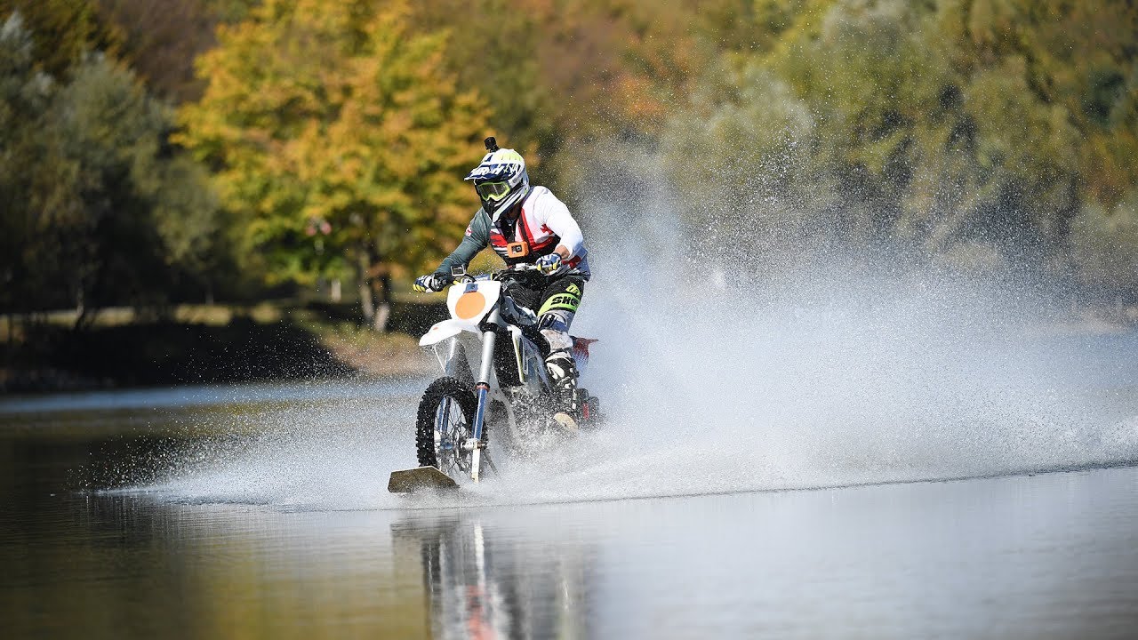 Water ride in Kvareli Lake, Georgia - Motorcycle on the water Husqvarna ...