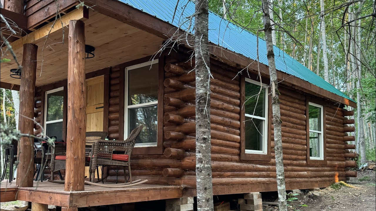 Building an off grid log cabin,working on the windows and great ...