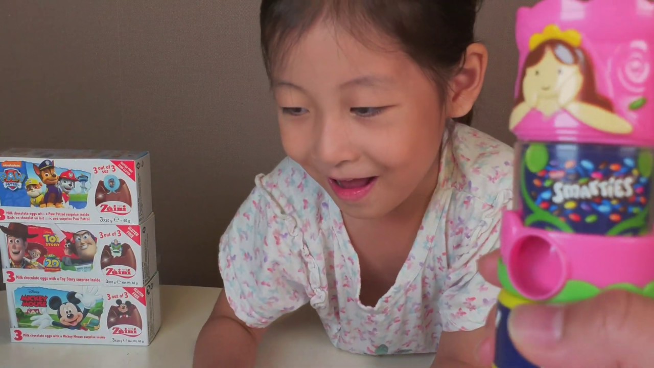 Nestle chocolate dispenser,smarties & Disney egg toys! - YouTube