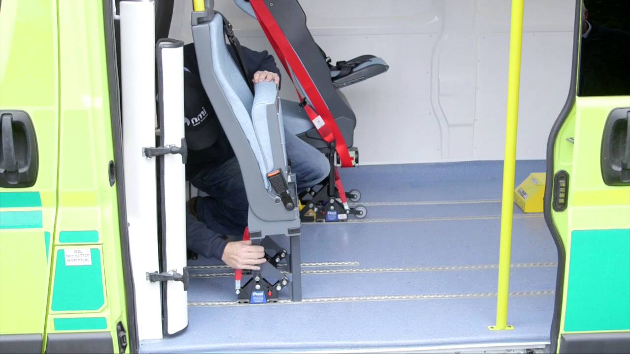 NMI. Rear facing attendant seat - YouTube