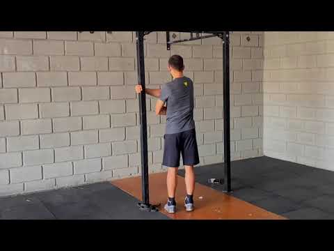 Standing Cuff Stretch - YouTube