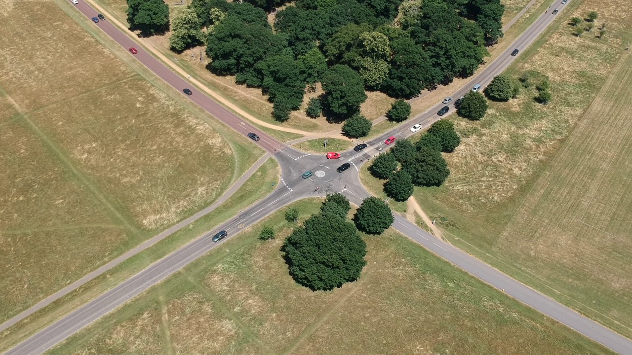 UK mini roundabout - YouTube
