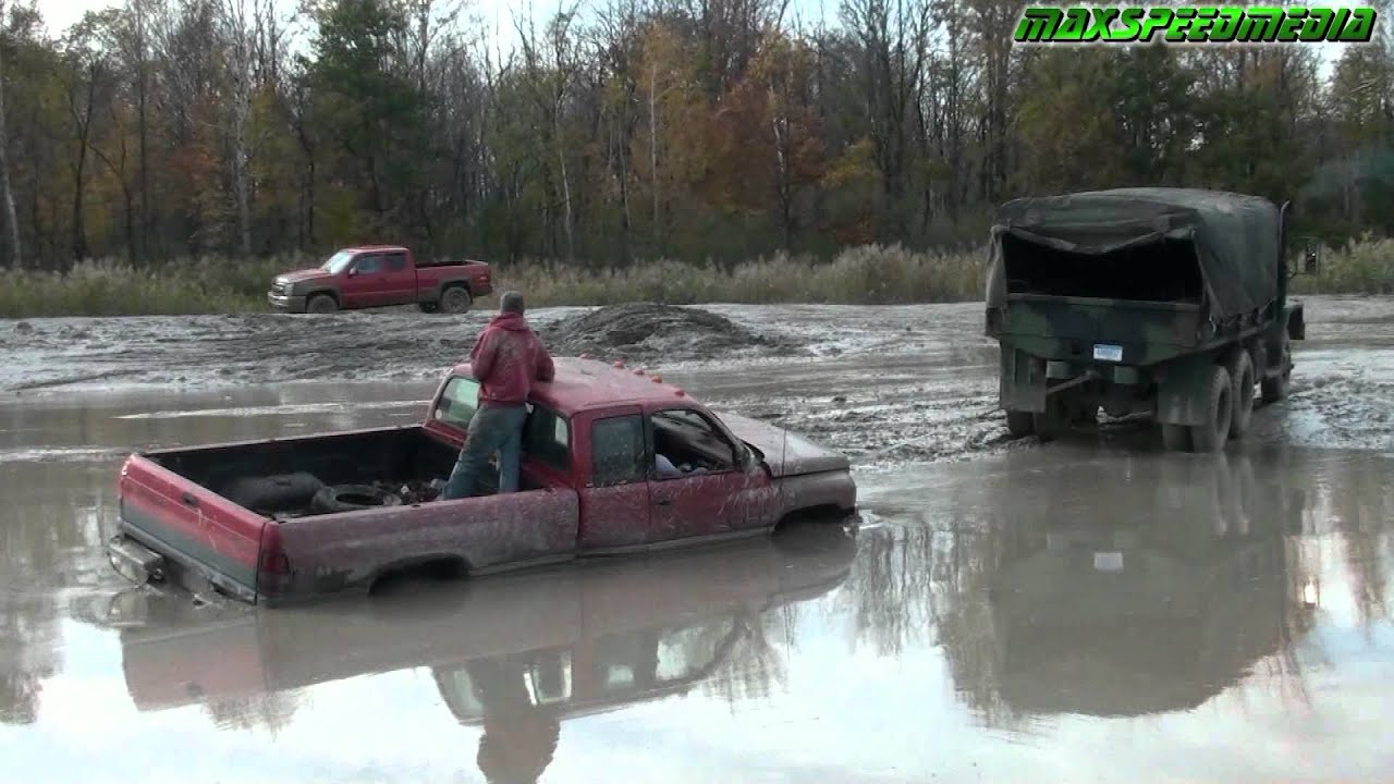 Dodge Ram getting stuck in deep mud. - YouTube