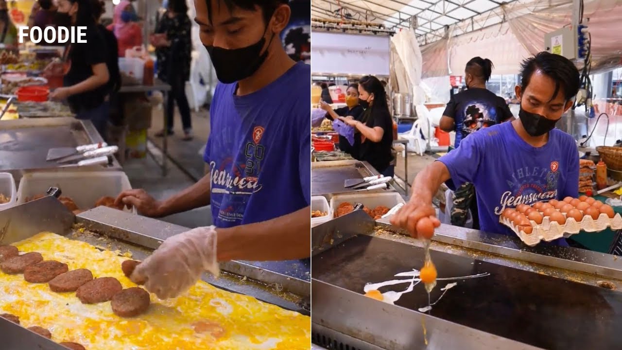 This stall in SINGAPORE cooks up to HUNDREDS of RAMLY BURGER at once ...