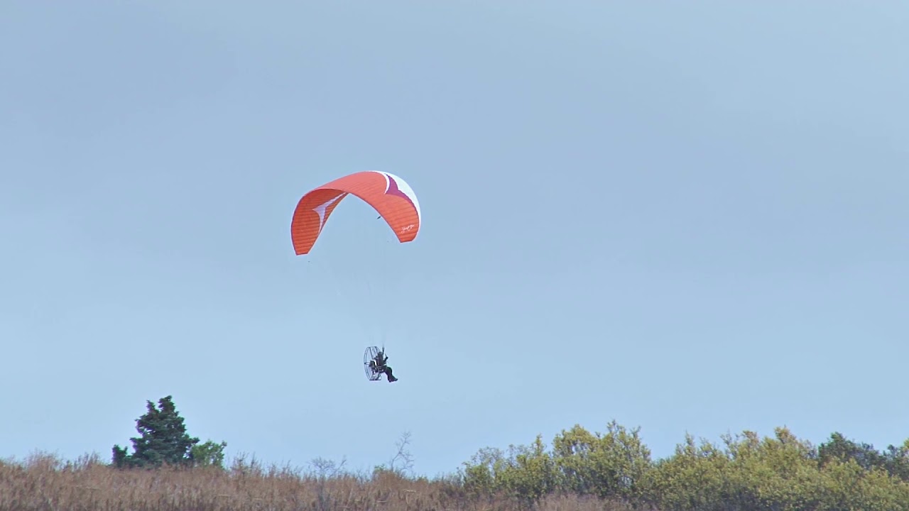 man in propeller guided parachute - YouTube