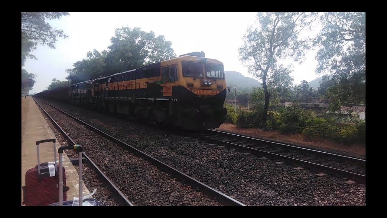 WDG-4d and WDG-4 collectively hauls freights!!! and slightly honks at ...