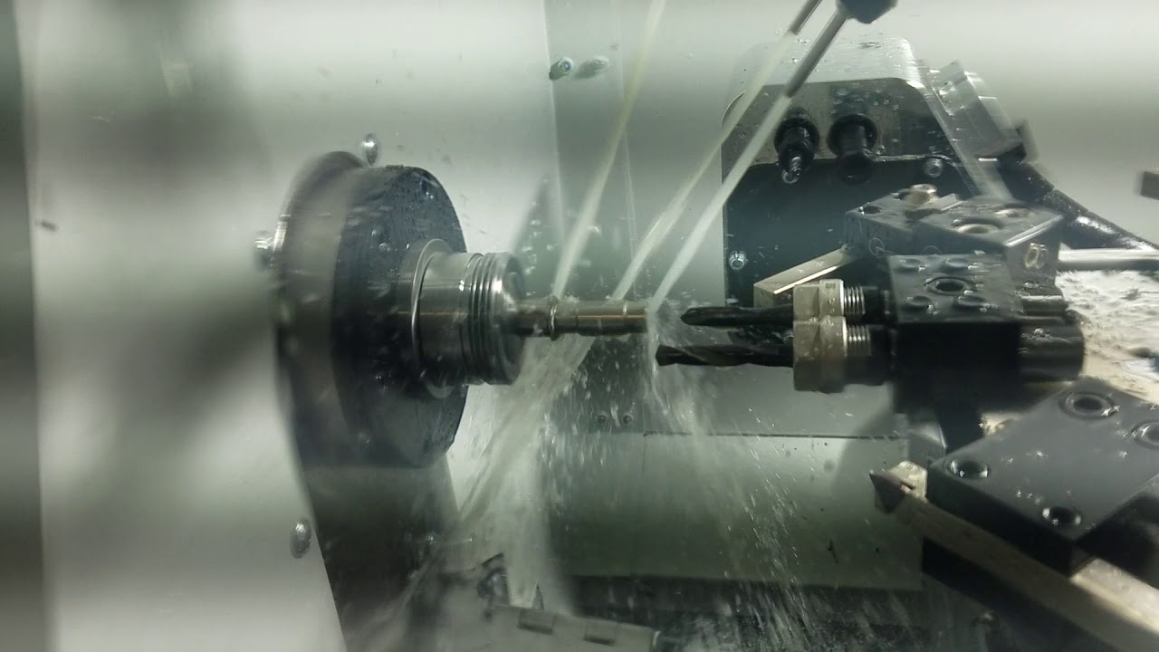 Haas CL-1 with live tooling and bar push to stop - YouTube