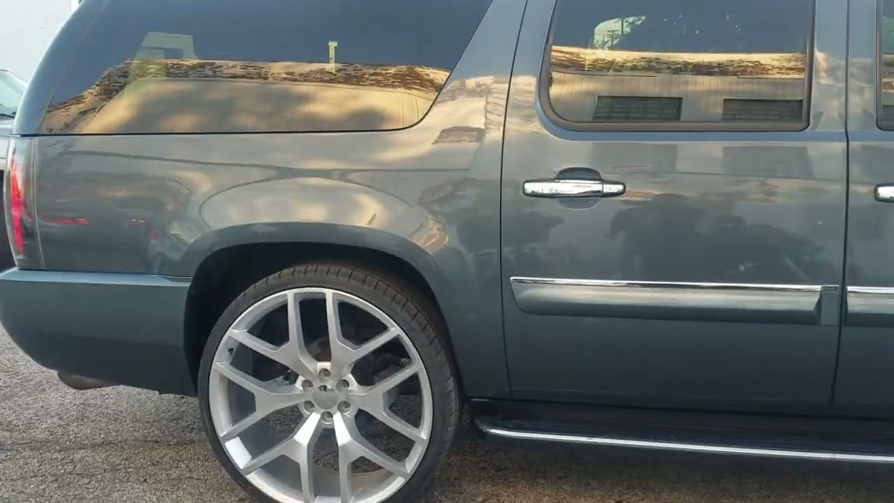 Gmc Yukon Denali on 28 inch factory replica wheels - YouTube