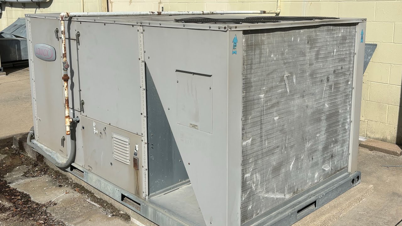 Noisy 2008 Lennox 10 ton packaged RTU air conditioner running on a hot ...