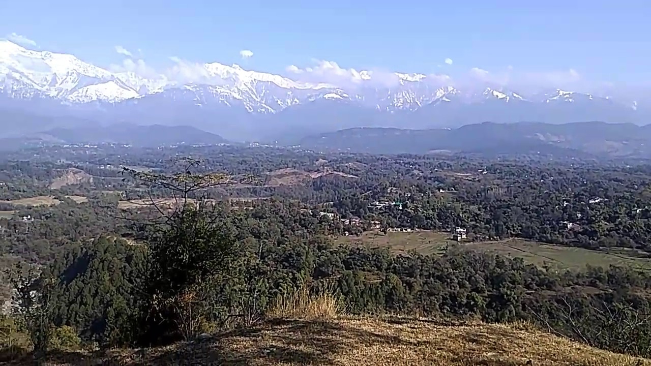 View of dhouladhar hills and palampur baijnath valley from kailashpur ...