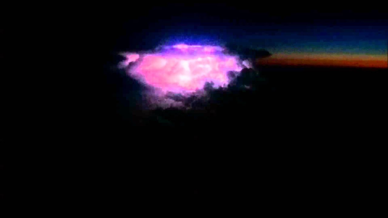 Lightning from plane window - YouTube
