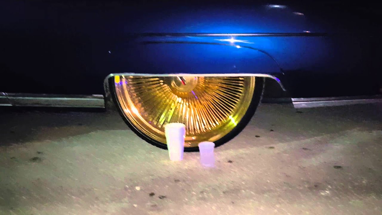 CANDY BLUE CHEVY DONK VERT SQUATING ON 24" GOLD D - YouTube