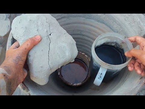 Soft pure mud dirt clay pot crumbling with brown black paste dedicated ...
