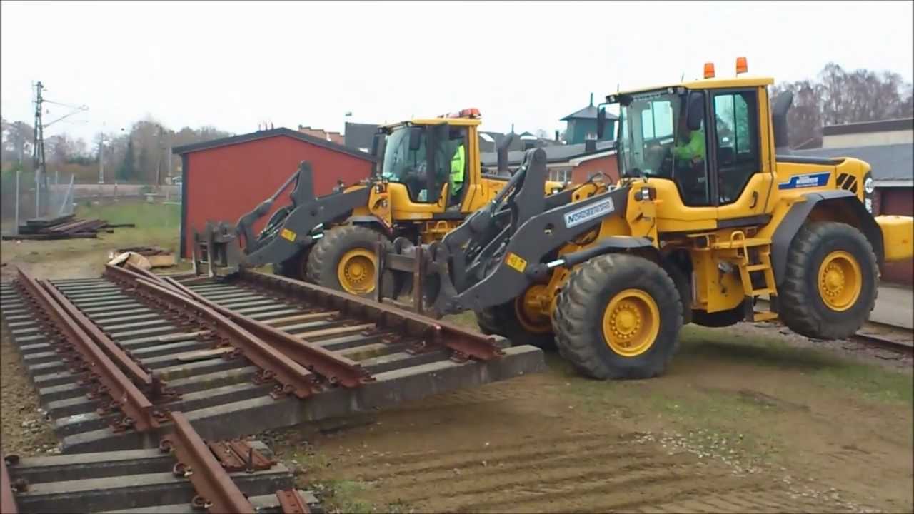 Volvo L90's moving a railroad switch (plus bobcat) - YouTube