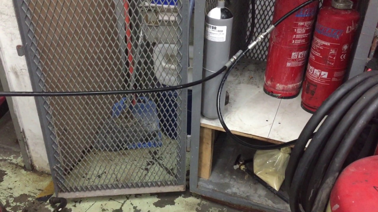 Hydro testing offoam fire extinguisher - YouTube