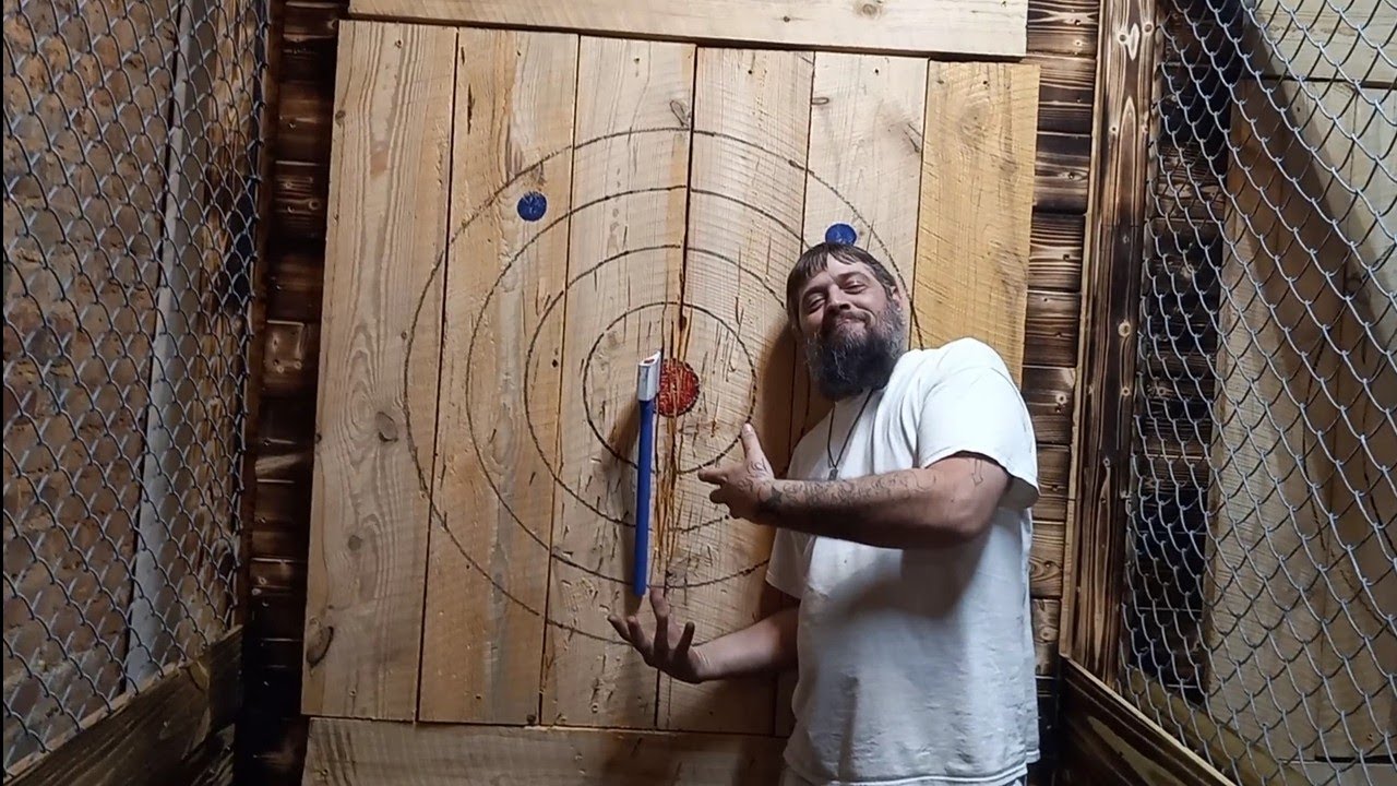 wolverine axe throwing in Woodruff!!!! - YouTube