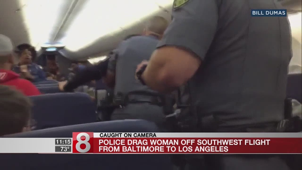 Police drag woman off Southwest flight - YouTube
