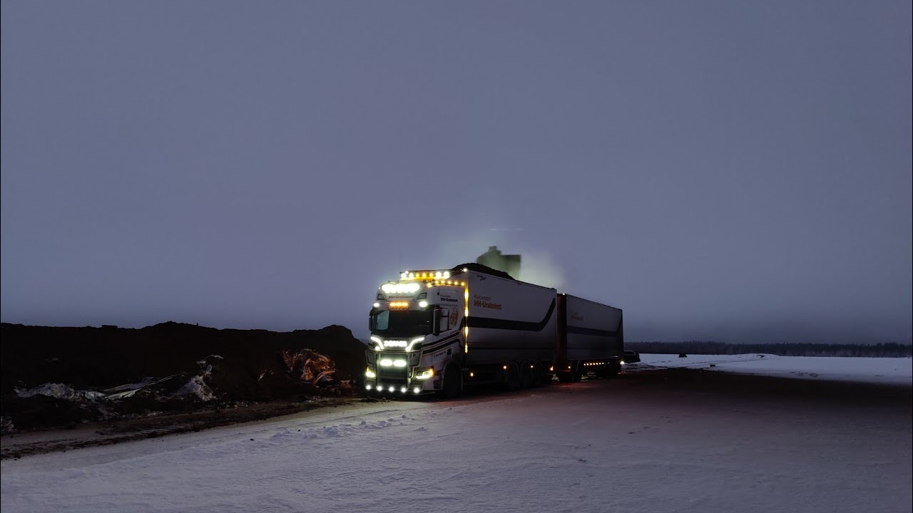 Peat load pickup from winter road - YouTube
