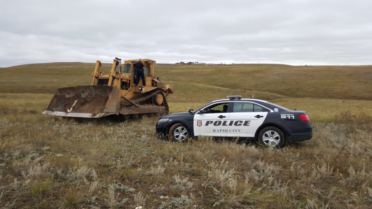 RCPD responds to reckless suspect causing damage in bulldozer - YouTube