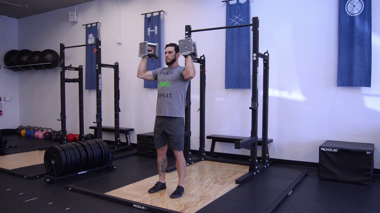 Dumbbell Standing Overhead Press - Exercise Demonstration - YouTube