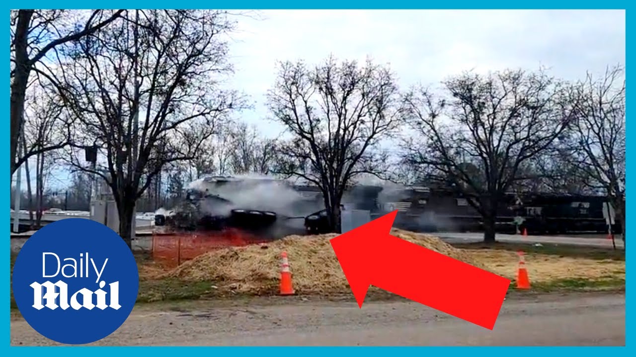 Unstoppable train crashes into truck lugging concrete beam - YouTube