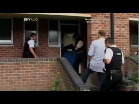 Idiot police raid wrong house then laugh - YouTube
