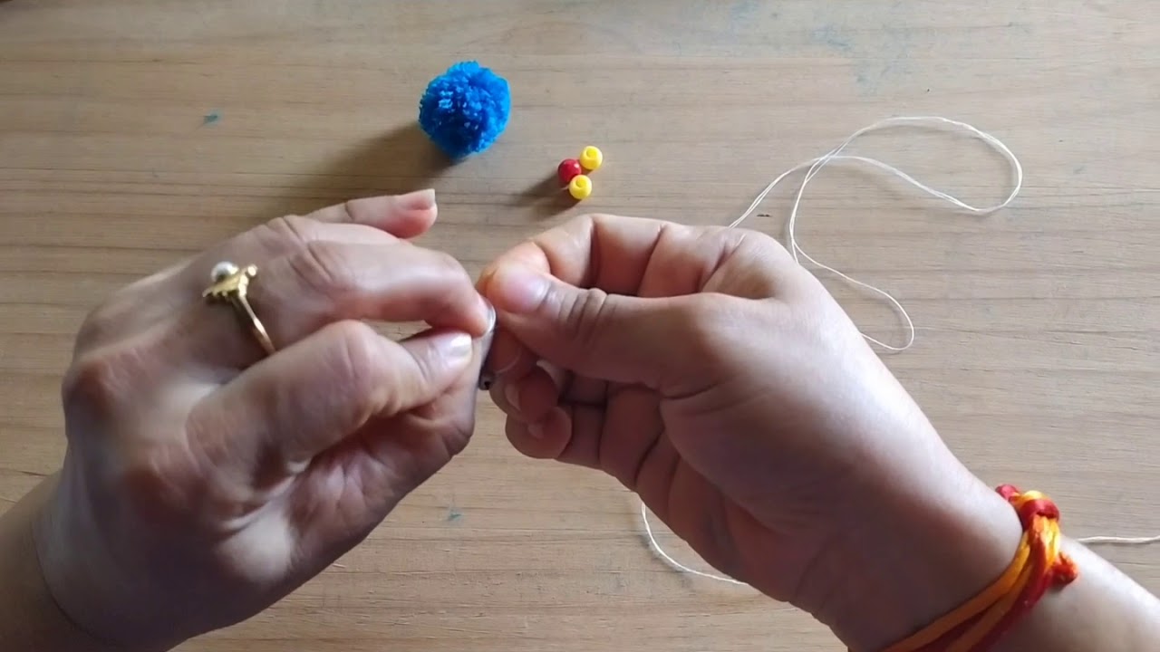 Making key chain using woolen balls - YouTube
