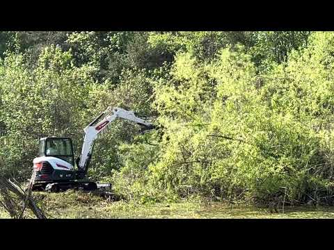 Bobcat E60 with Rut MFG Disc Mulcher - YouTube