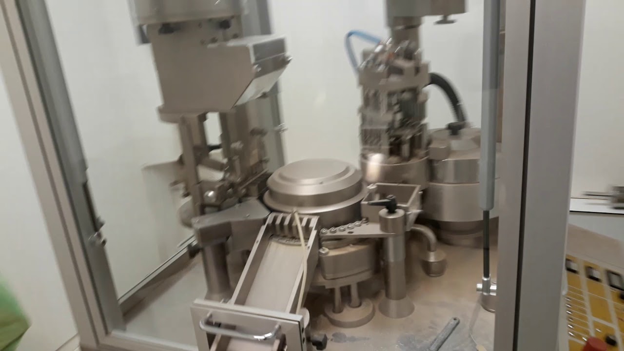 Used IMA / Zanasi 40F Capsul filling machine / encapsulator - YouTube