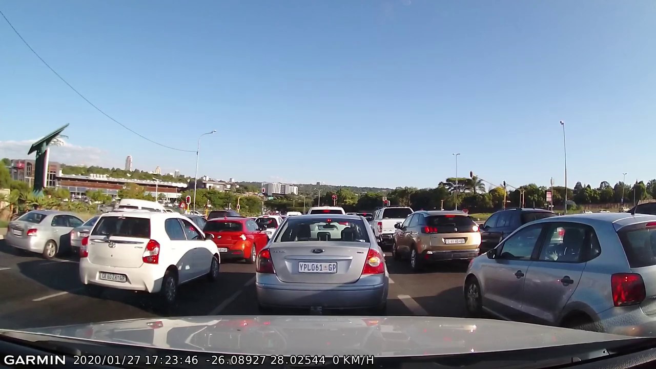Driver Jumps Traffic Queue - YouTube