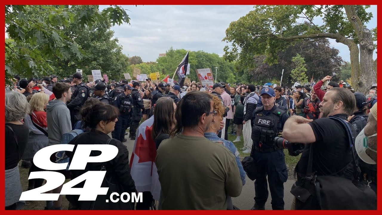 Counter-protesters and ‘Canada First’ rally clash in Toronto - YouTube