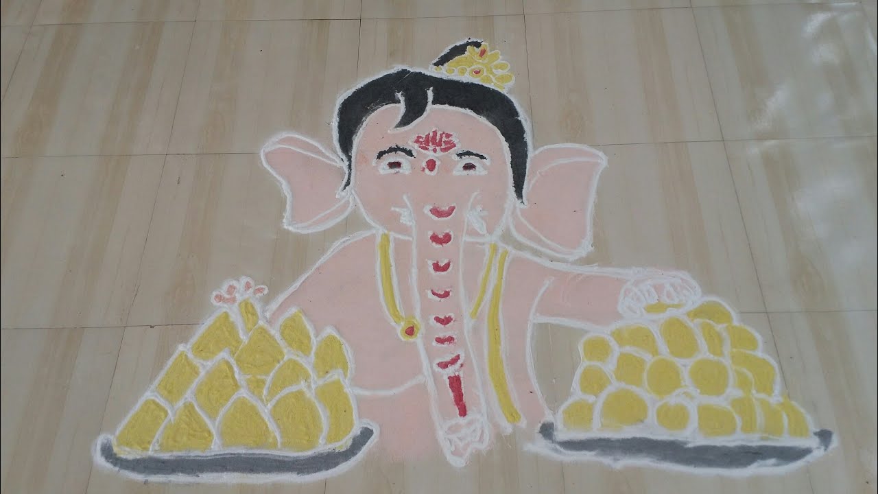 Making Bal Ganesh with laddoos and modak with Rangoli - YouTube