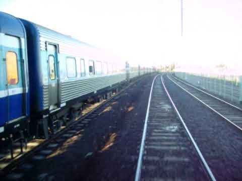 XPT, Broadmeadows, Melbourne, passing a Connex Train. - YouTube