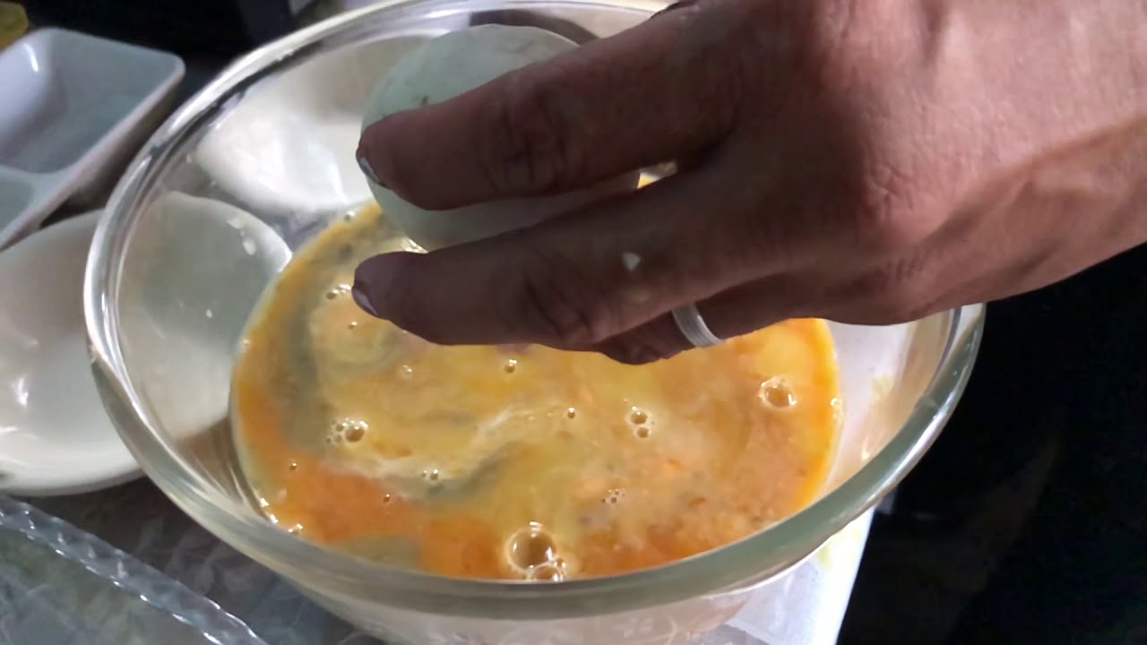 Cracking a rotten duck eggs for an omelette in slow-motion. - YouTube