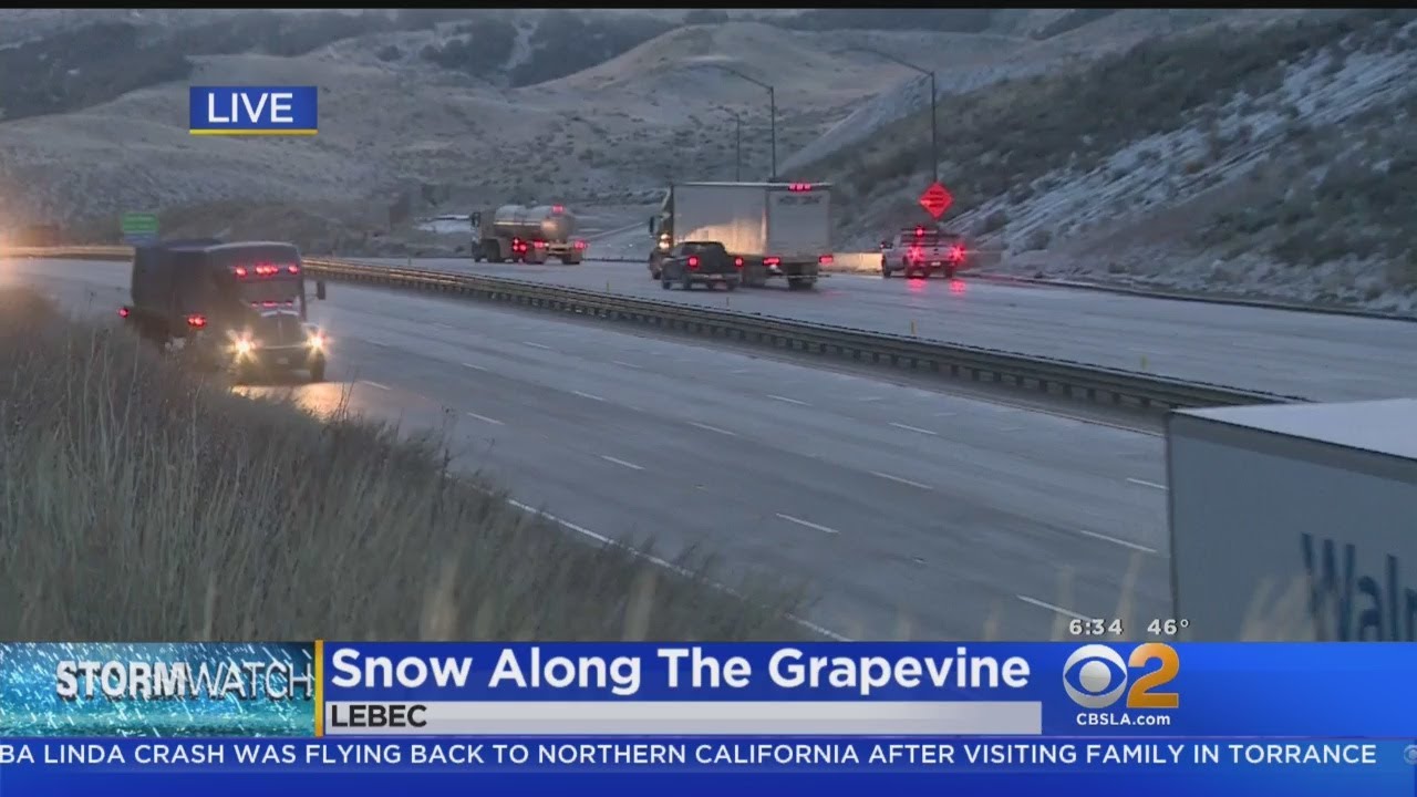 Snow-Dusted Grapevine Remains Open - YouTube