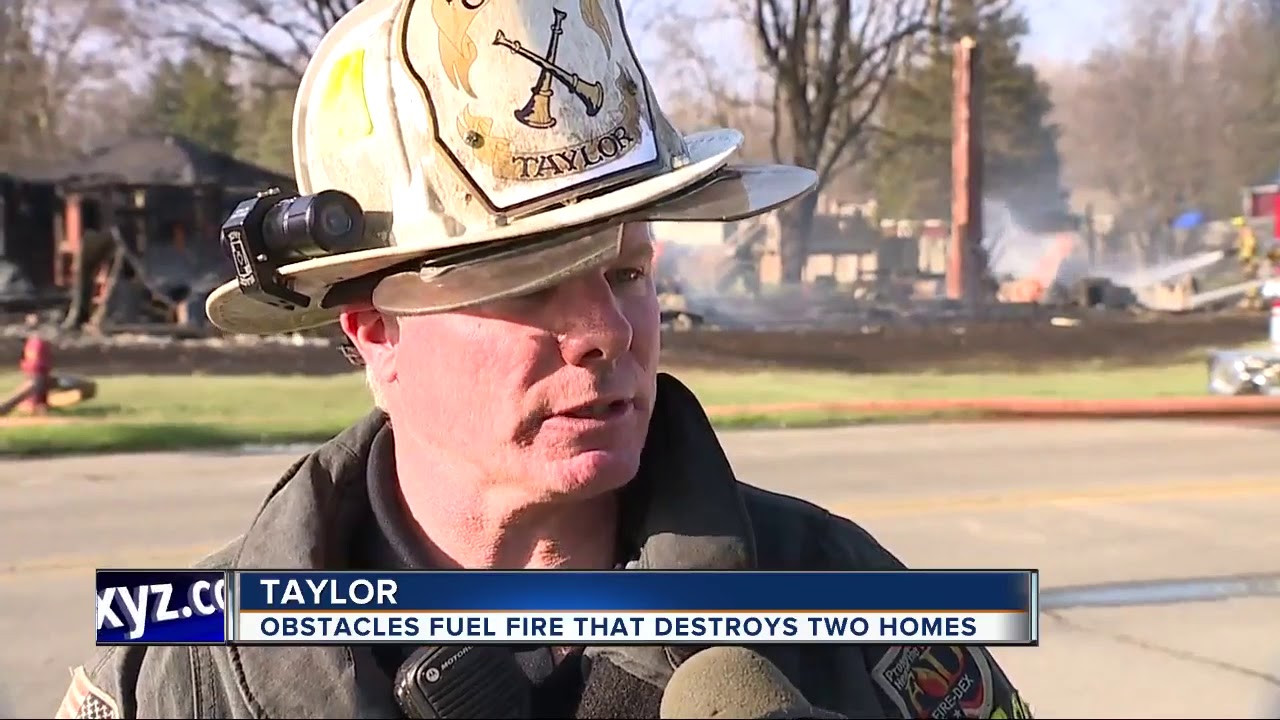 Large fire destroys two Taylor homes, forces families out - YouTube