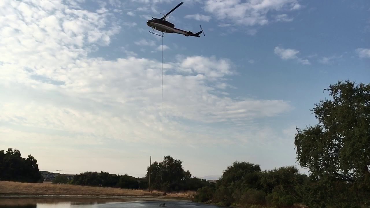 Bell Huey Uh-1D Water Bucket slow motion - YouTube