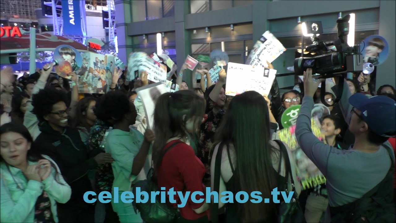 BTS fans cheer and sing outside the American Music Awards - YouTube