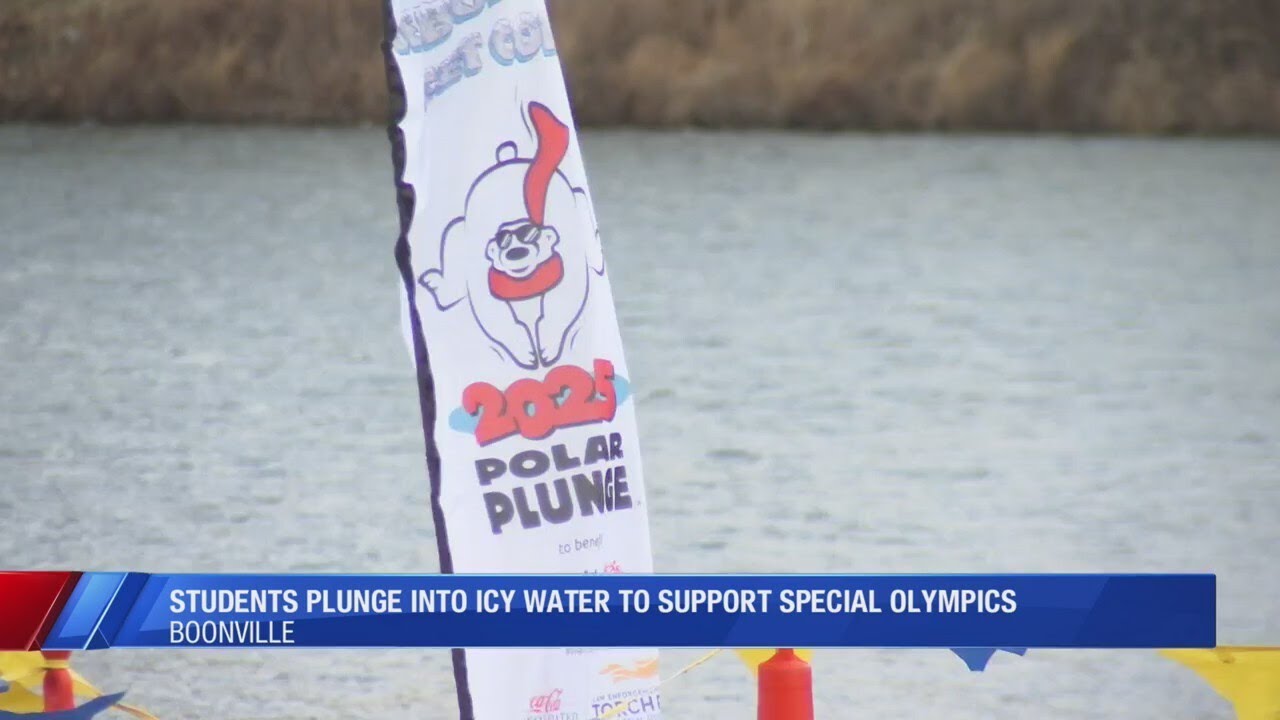 Students plunge into icy water to support Special Olympics - YouTube