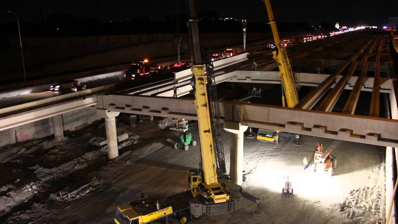 Davis Crane setting beams on LBJ Express project - YouTube