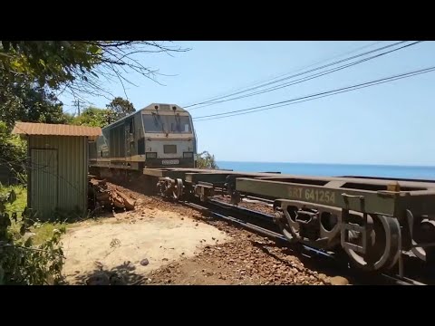 Strange freight train - YouTube